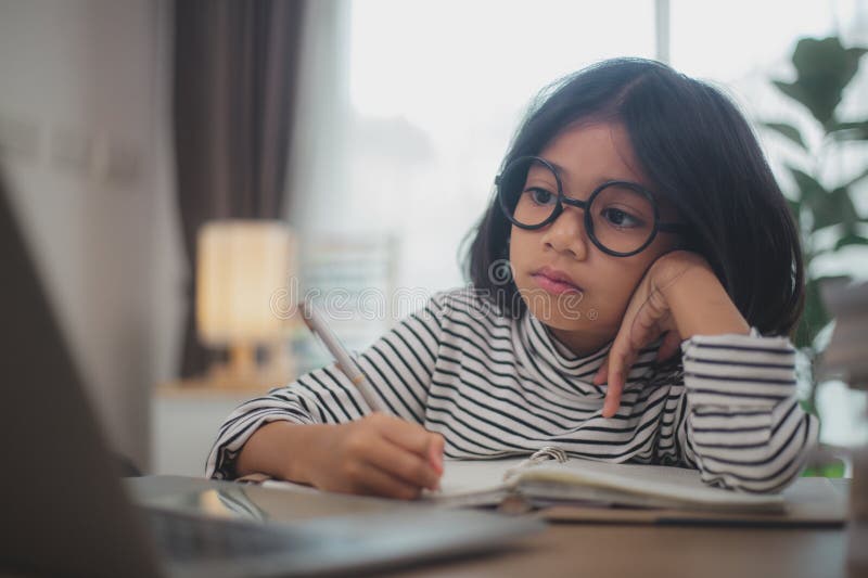 Cute Asian Child Girl Learning To Count Using an Abacus in the ...
