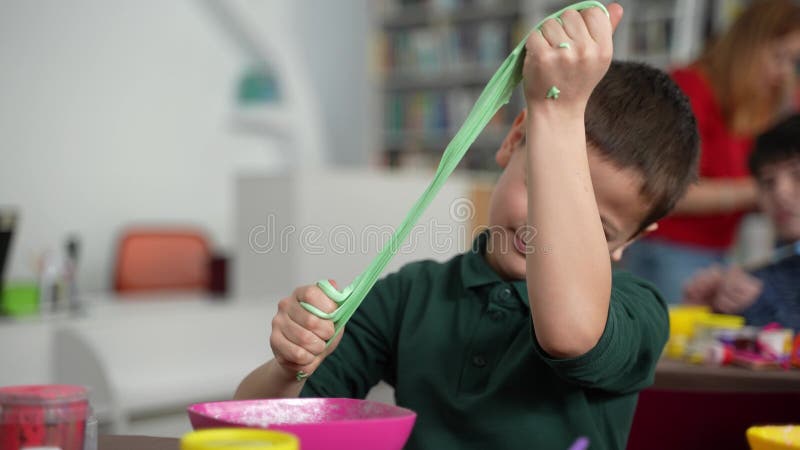 Cute Autistic Boy Playing Slime at Master Class Stock Footage - Video ...
