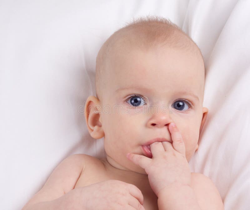 Adorable cute baby face stock image. Image of mouth, biting - 33734189