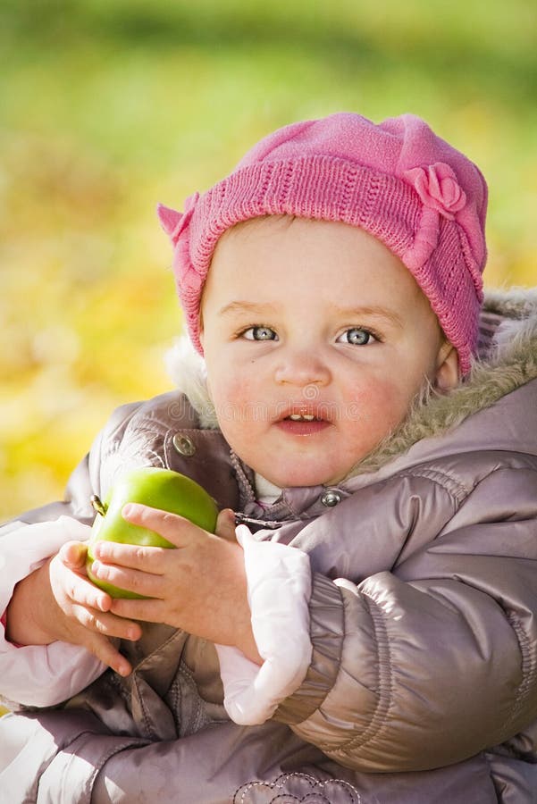 Cute baby with apple stock photo. Image of fall, portrait - 16779194