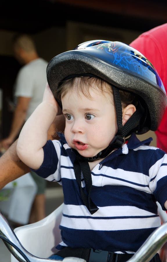 Cute Baby with Bicycle Helmet Stock Photo - Image of posture, polo ...