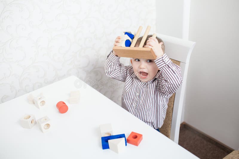 Cute baby boy with blocks stock photo. Image of person - 52526222