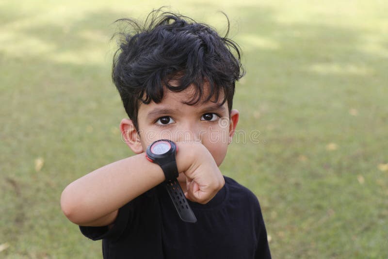 Cute Baby Boy Posing with His Wrist Watch Stock Image - Image of ...
