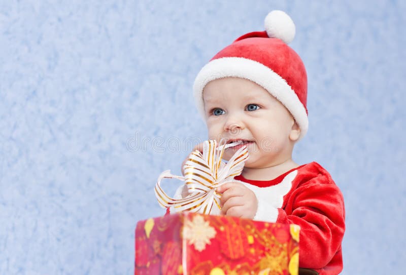 Cute baby boy santa helper stock image. Image of celebration - 35570267