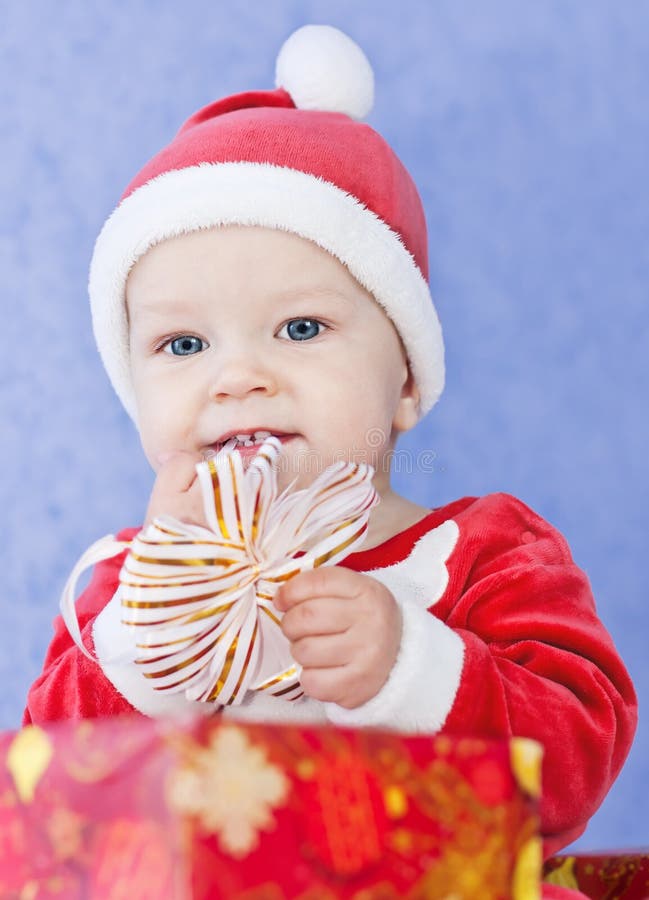 Cute baby boy santa helper stock image. Image of cute - 35570283