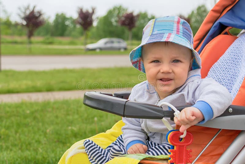 Baby Boy and His Sister Sleeping in a Stroller Stock Image - Image of ...