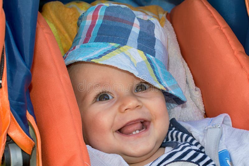 Cute Baby Boy in a Stroller Stock Photo - Image of beautiful ...