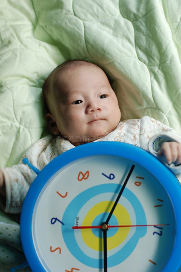Cute baby with clock stock photo. Image of living, cute - 8628470