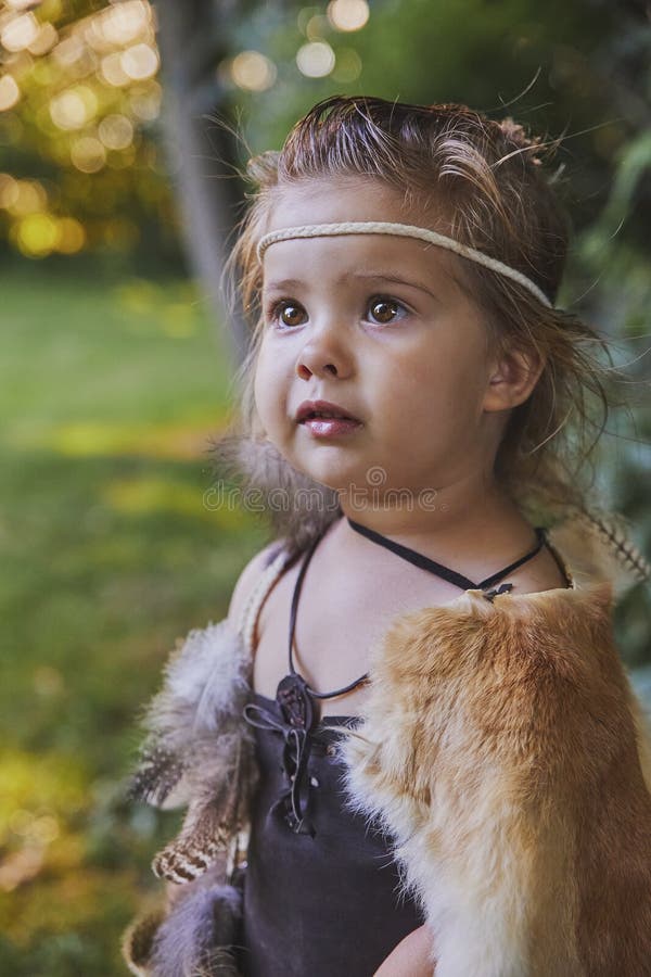 Cute Baby Dressed in the Clothes of Primitive People Stock Photo ...