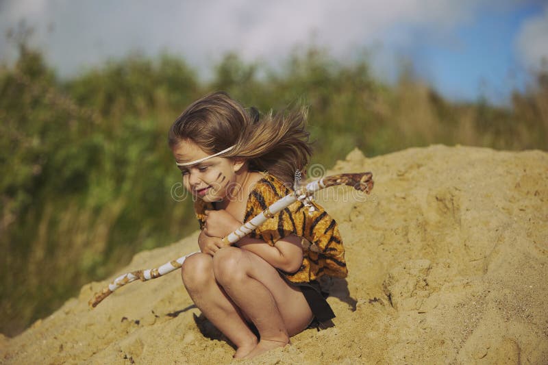 Cute Baby Dressed in the Clothes of Primitive People Stock Image ...