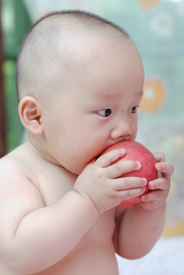 Cute Baby Eat Apple Picture. Image: 10034554