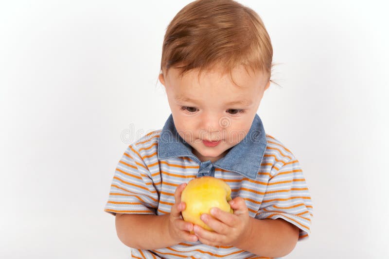 Cute baby eating apple stock image. Image of young, human - 88461503