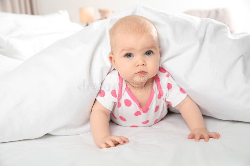 Cute Baby Girl in Bed at Home. Bedtime Stock Photo - Image of dream ...