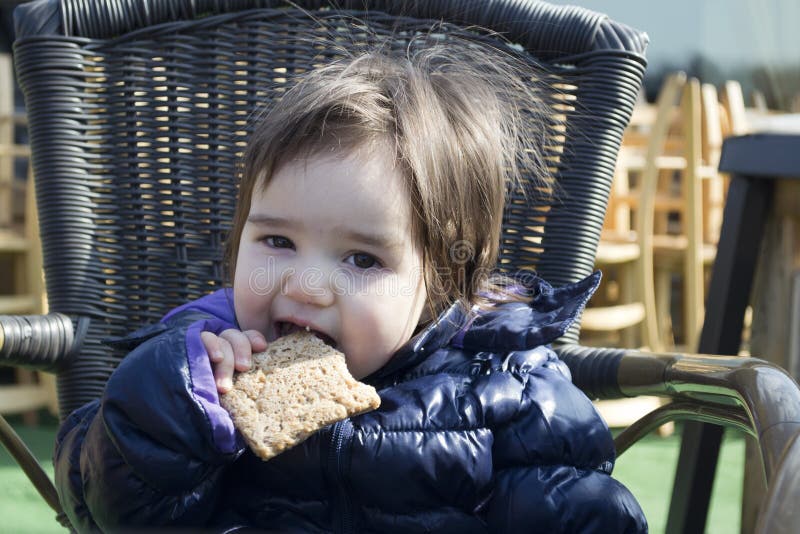Cute Baby Girl Eat a Cookie Stock Photo - Image of family, nice: 24247376