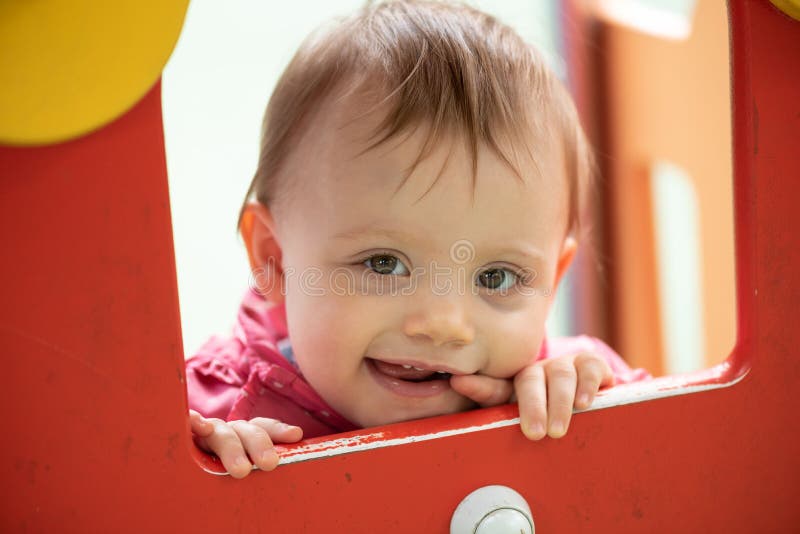 Cute Baby Girl Having Fun on a Playground Stock Photo - Image of play ...