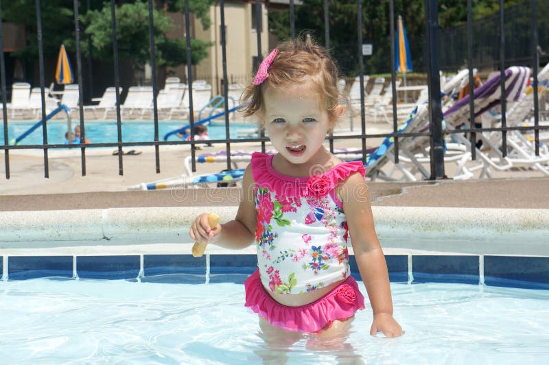 Cute Baby Girl is Having Fun in the Pool Stock Photo - Image of humor ...