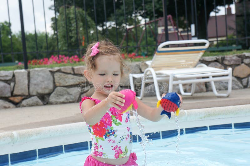 Cute Baby Girl is Having Fun in the Pool Stock Photo - Image of ...
