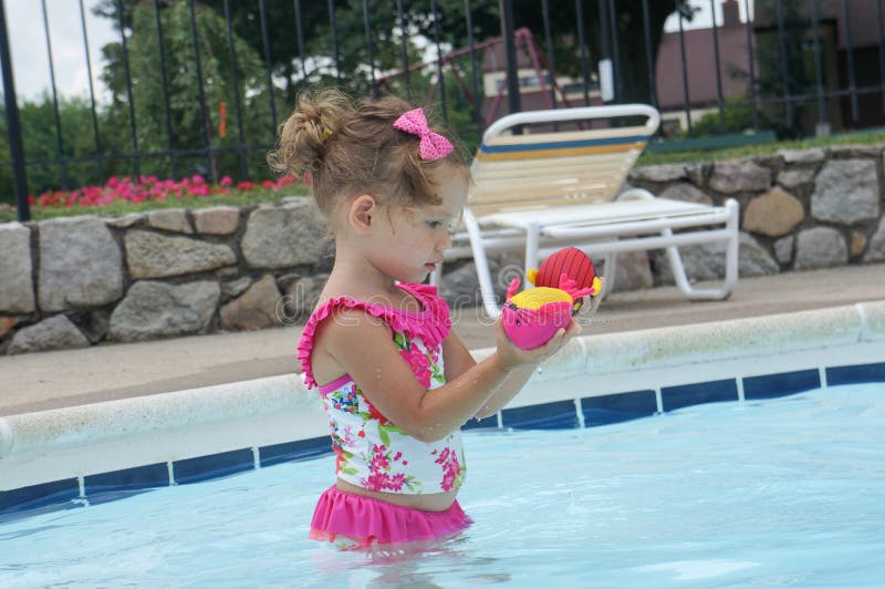Cute Baby Girl is Having Fun in the Pool Stock Image - Image of ...