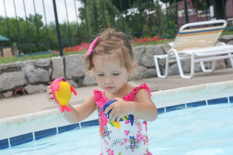 Cute Baby Girl is Having Fun in the Pool Stock Image - Image of focus ...