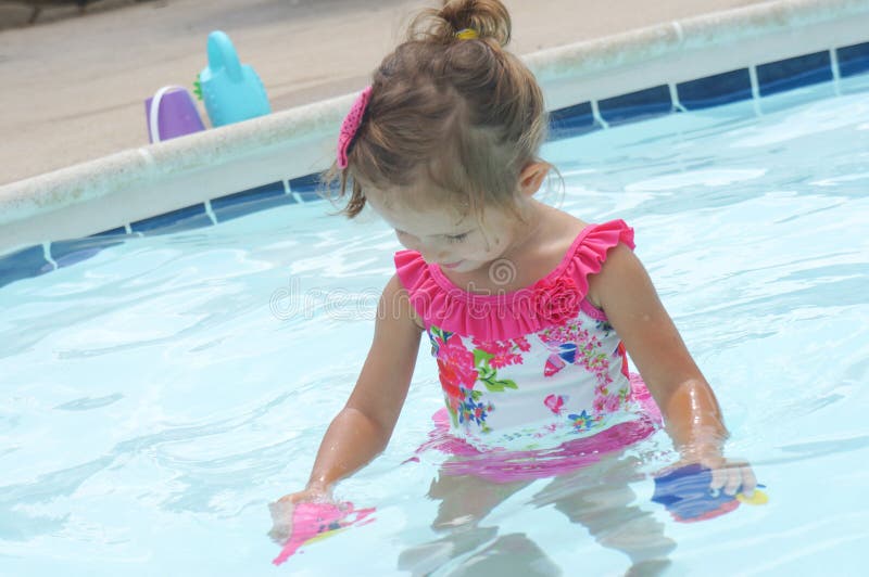 Cute Baby Girl is Having Fun in the Pool Stock Image - Image of facial ...