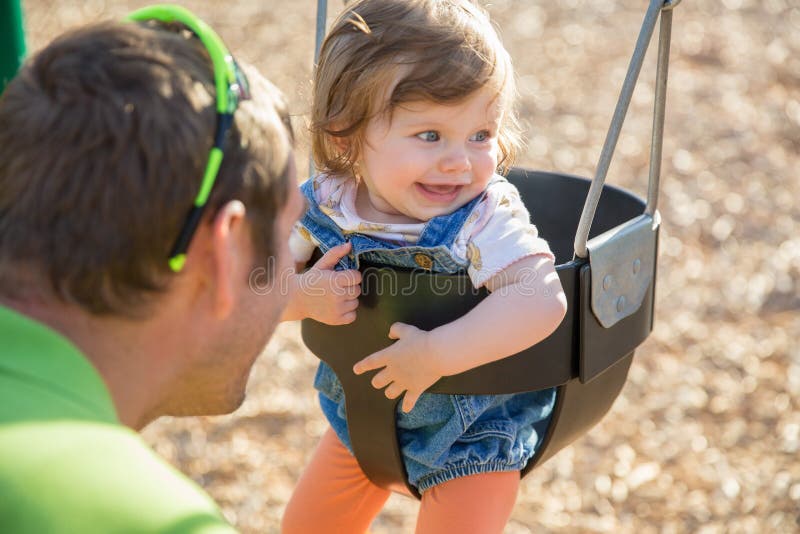 Cute Baby Girl Having Fun on a Swing Stock Photo - Image of joyful ...
