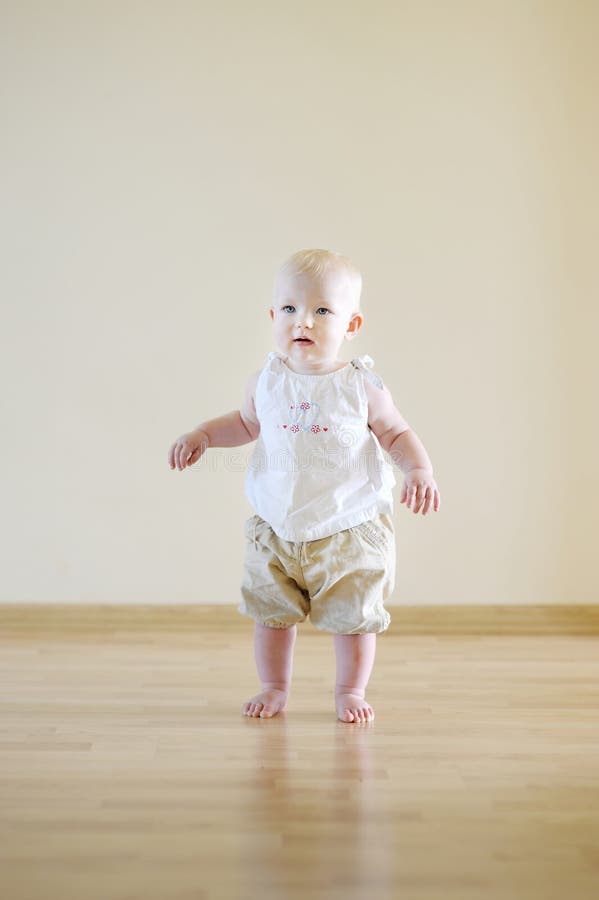 Cute Baby Girl Learning To Walk Stock Image - Image of childhood ...