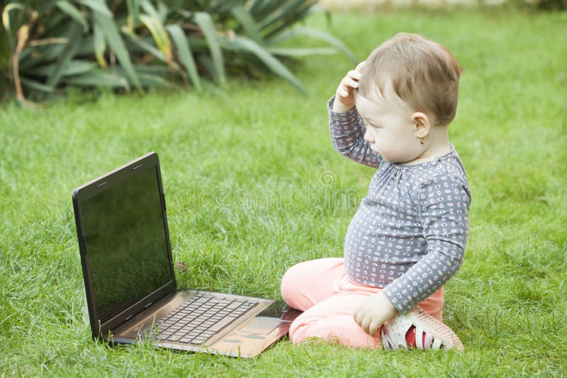 Cute Baby Girl Using a Laptop Stock Photo - Image of happy, clean: 44334270