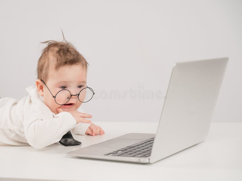 Cute Baby in Glasses and Suit Working on Laptop. Stock Photo - Image of ...
