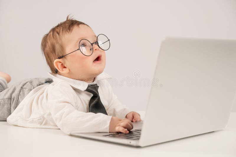 Cute Baby in Glasses and Suit Working on Laptop. Stock Image - Image of ...