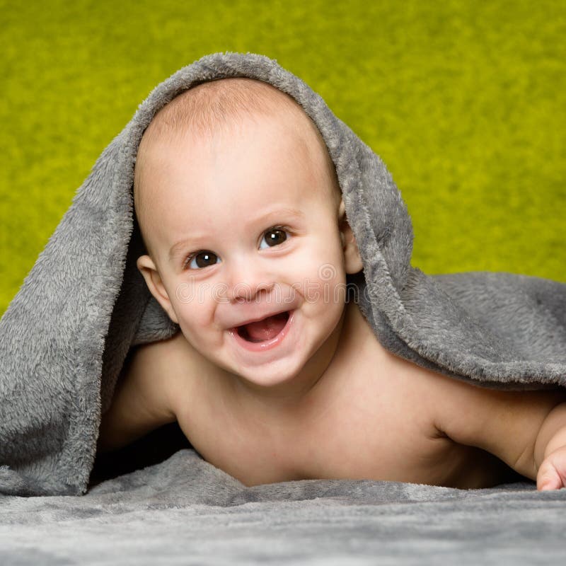 Baby under towel stock photo. Image of caucasian, innocence - 110946926