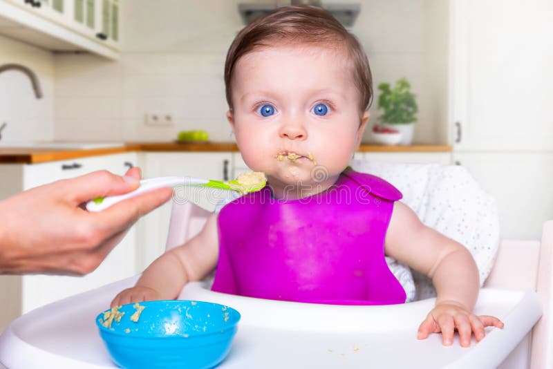 Cute Baby Has for the First Time Solid Foods Stock Image - Image of ...