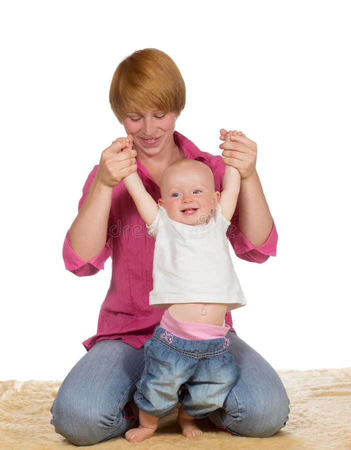 Cute baby learning to walk stock photo. Image of affection - 25589552