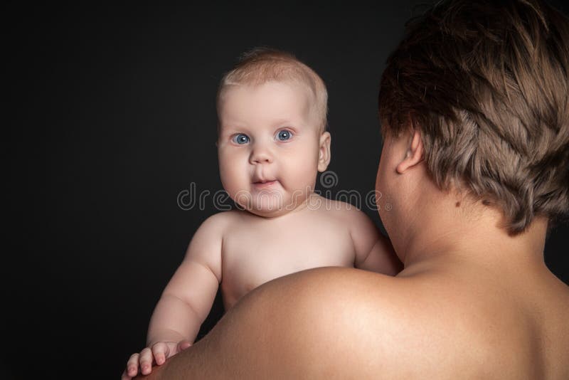 Cute Baby Looking Over Father S Shoulder Stock Image - Image of newborn ...
