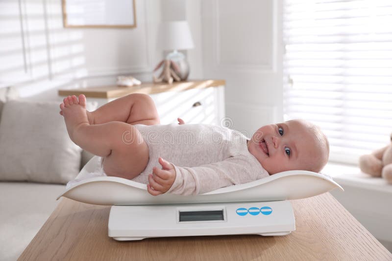 Cute Little Baby Lying on Scales at Home Stock Image - Image of care ...
