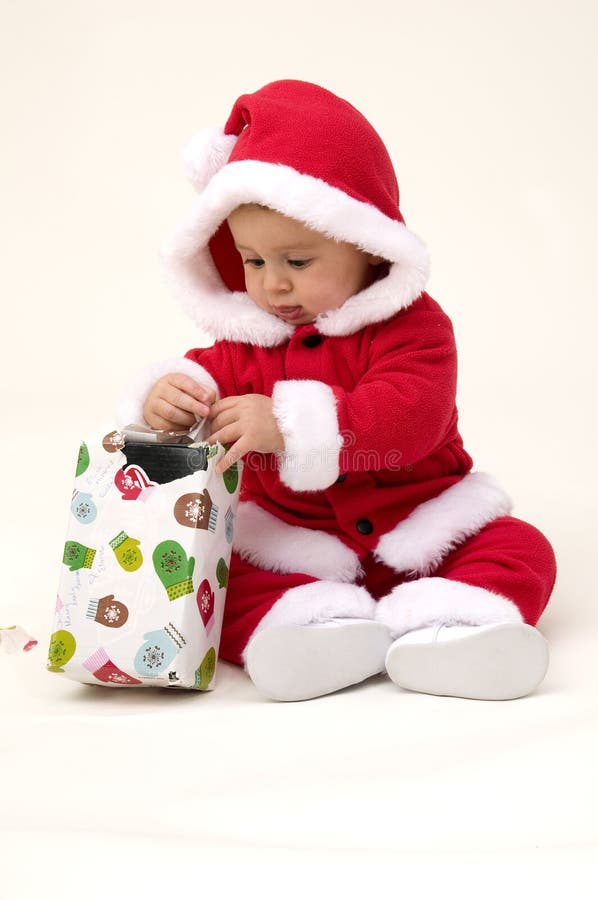 Cute Baby Opening Present stock photo. Image of baby - 16755396