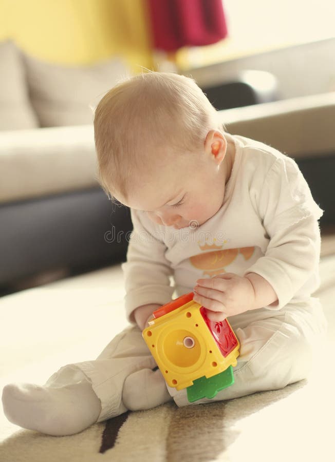 Cute Baby Play at Home with Toy Stock Photo - Image of person, play ...