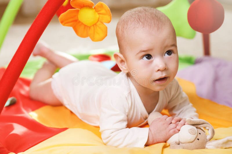 Cute Baby is Playing on the Activity Mat Stock Image - Image of ...
