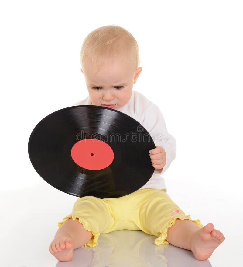 Baby Playing with Old Vinyl Record on White Background Stock Photo ...