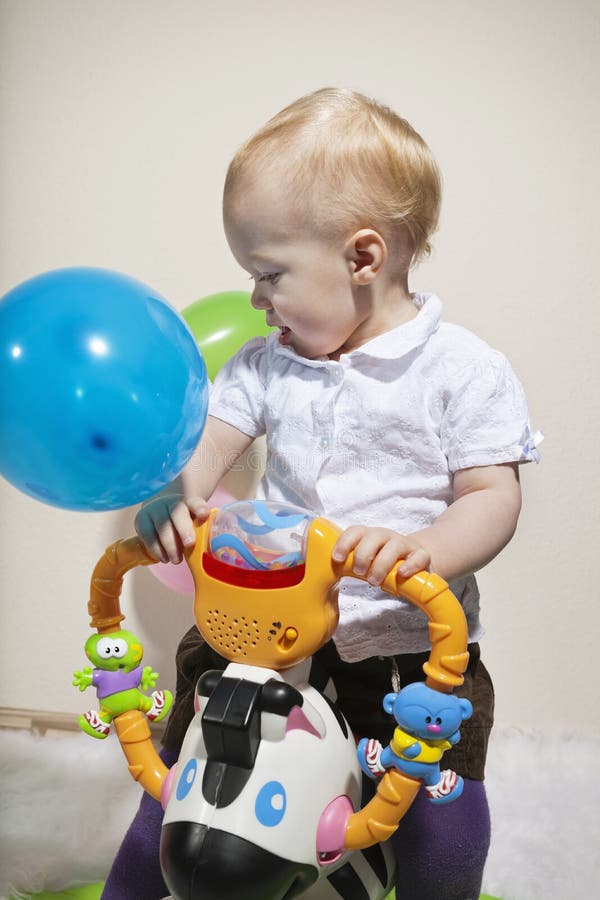 Baby Boy Riding on His First Bike without Pedals Stock Photo - Image of ...