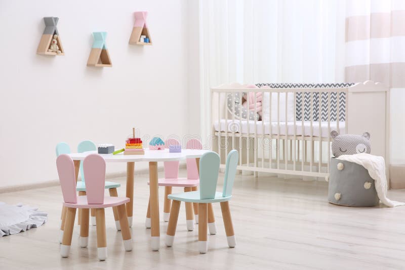Cute Baby Room Interior with Cot and Table Stock Photo - Image of crib ...