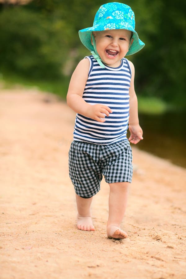 Cute baby running stock photo. Image of family, happiness - 69891074