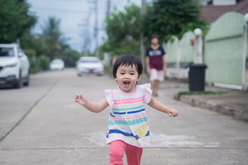 Cute Baby Running on the Road Stock Image - Image of outside, people ...