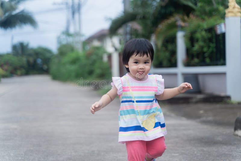 Cute Baby Running on the Road Stock Photo - Image of cute, athlete ...
