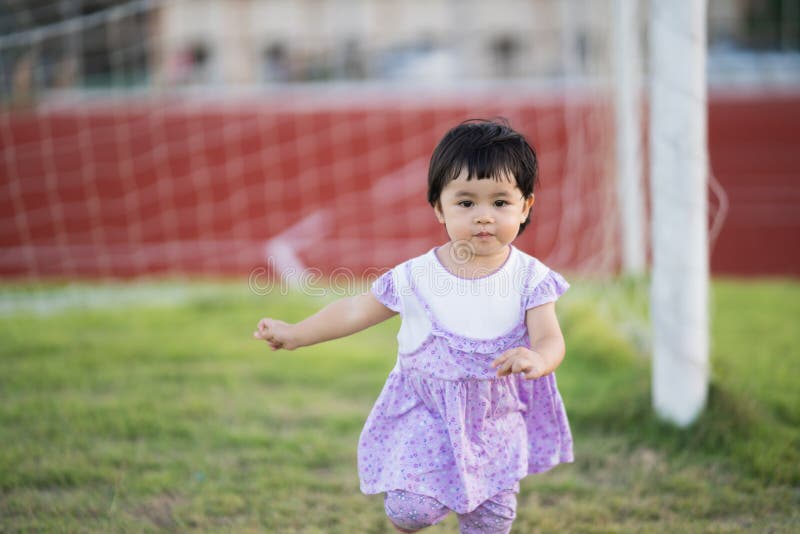 Cute Baby Running at Sport Stadium Stock Image - Image of family ...