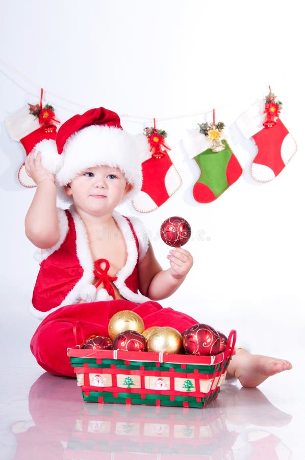 Cute Baby Santa Claus with Garlands. Stock Photo - Image of basket ...