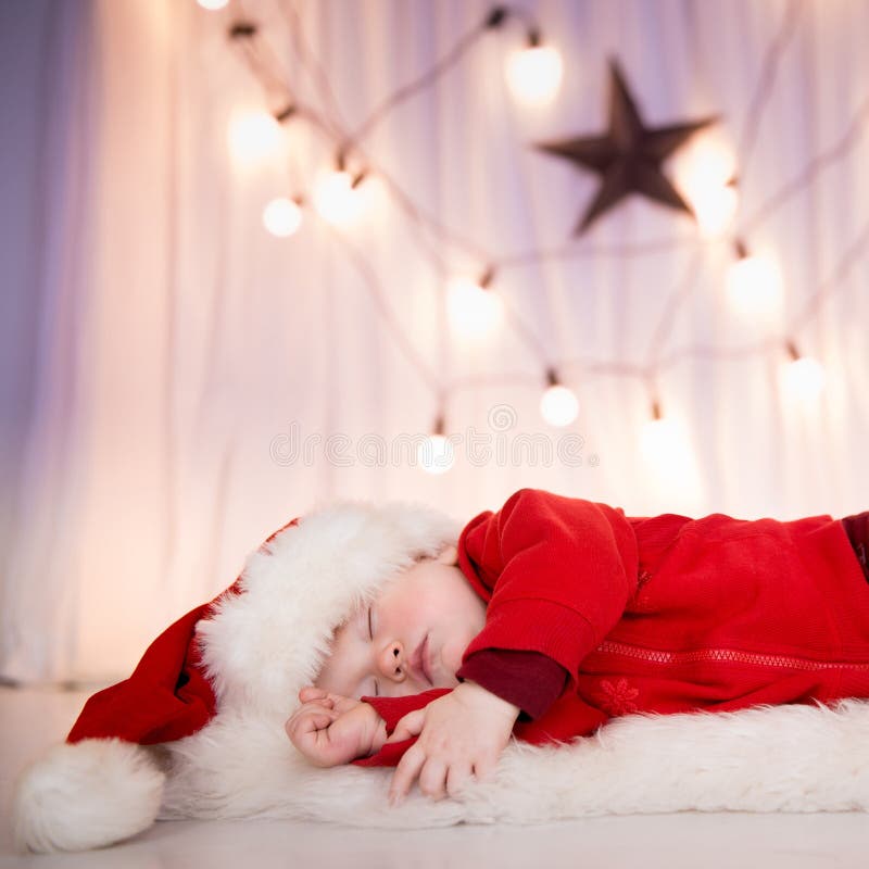 Cute baby santa sleeping stock image. Image of claus - 63605133