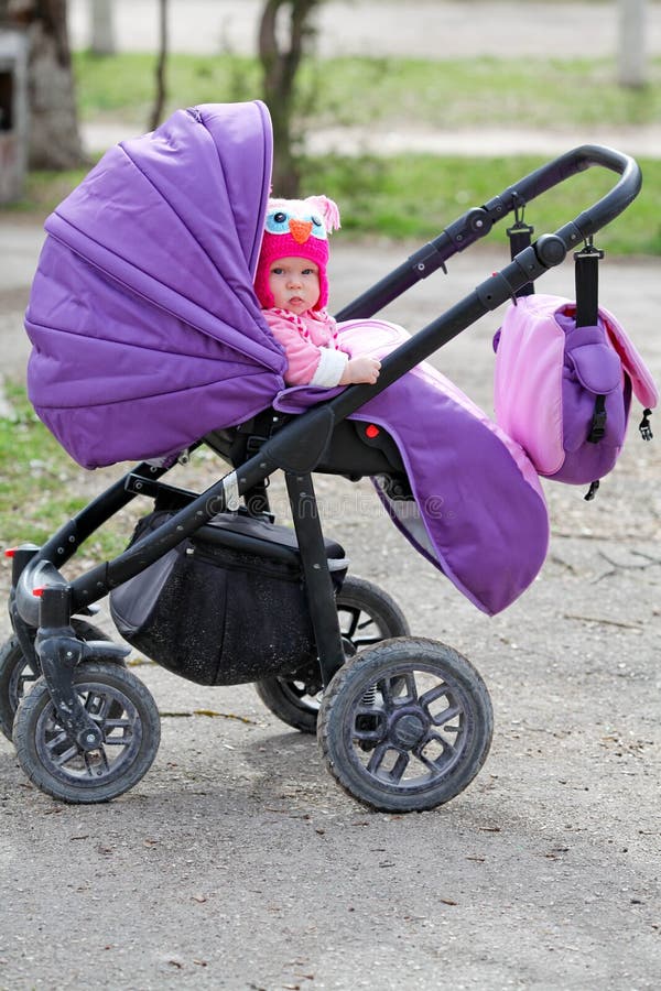 Cute Baby Sitting in the Stroller Stock Image - Image of female, bonnet ...