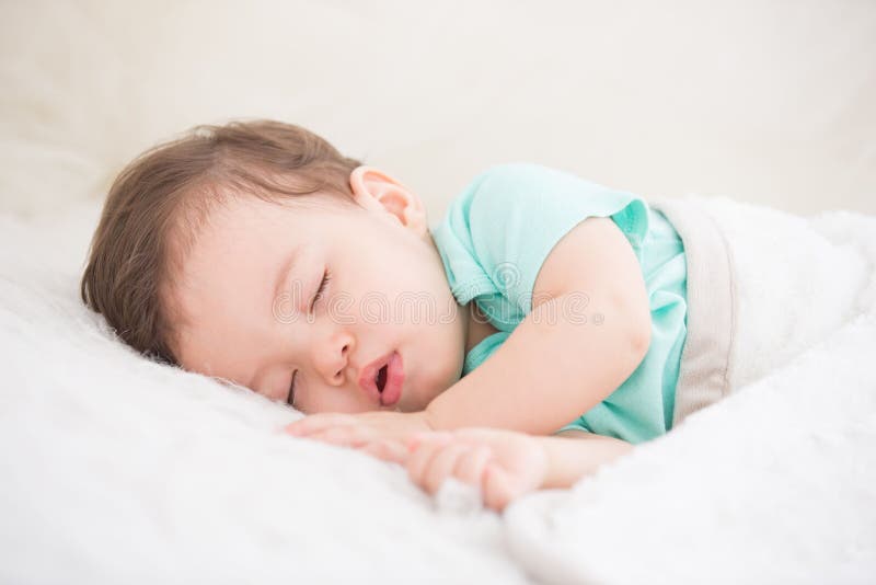 Cute baby sleeping stock image. Image of napping, close - 73583473