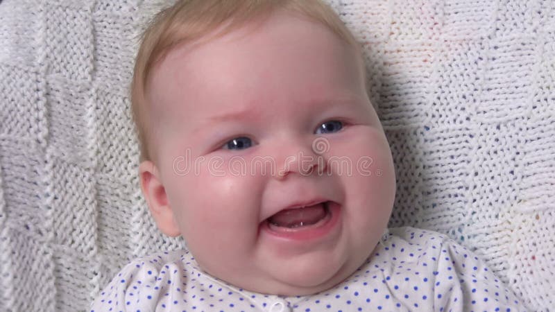 Cute baby smiling happily stock video. Video of life - 87317679
