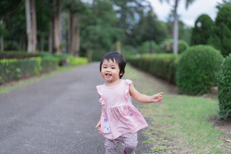 Cute Baby Smiling and Running at the Park Stock Image - Image of person ...
